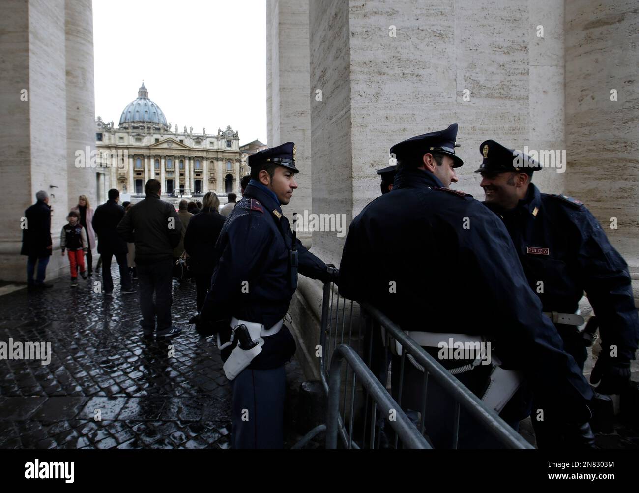 Italian police officers patrol St. Peter's Square, at the Vatican ...