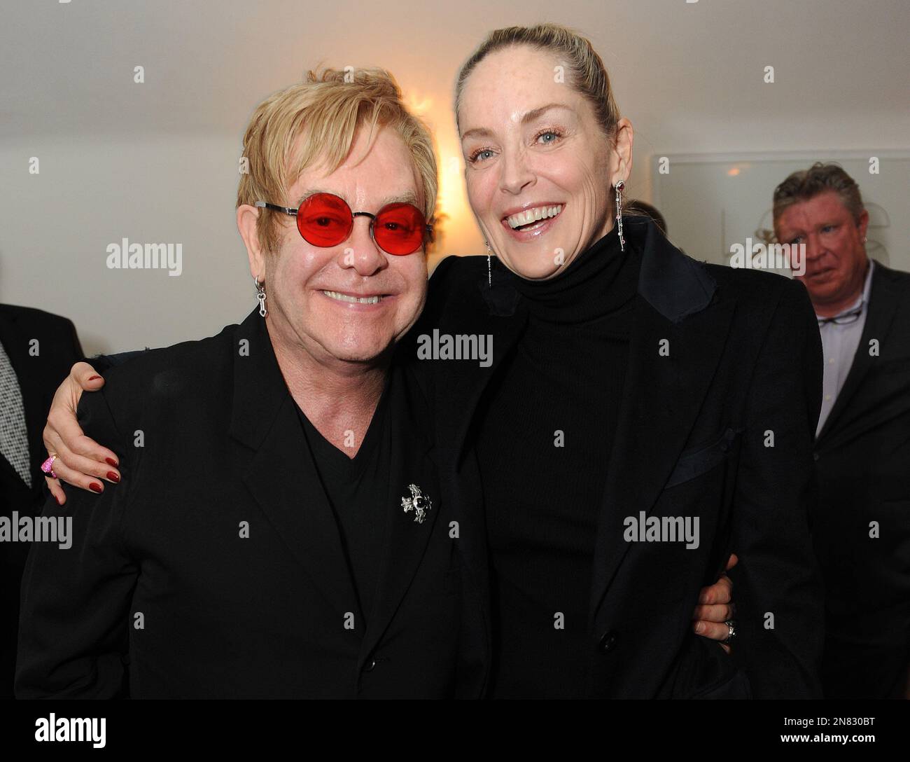 Sharon Stone, right, and Elton John attend LoveGold/EJAF Celebrate "How ...
