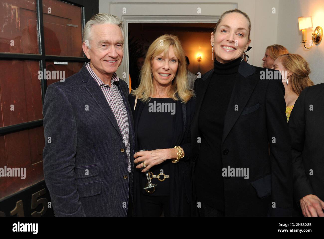 From left, Ian Telfer, Nancy Burke and Sharon Stone attend LoveGold ...