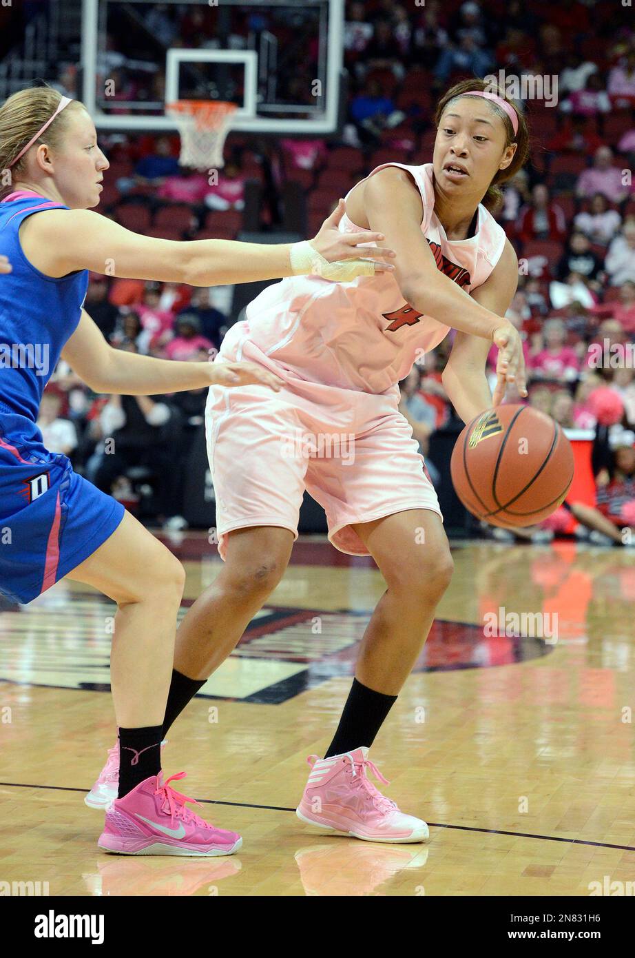 Louisville guard Antonita Slaughter, right, attempts to pass around the ...