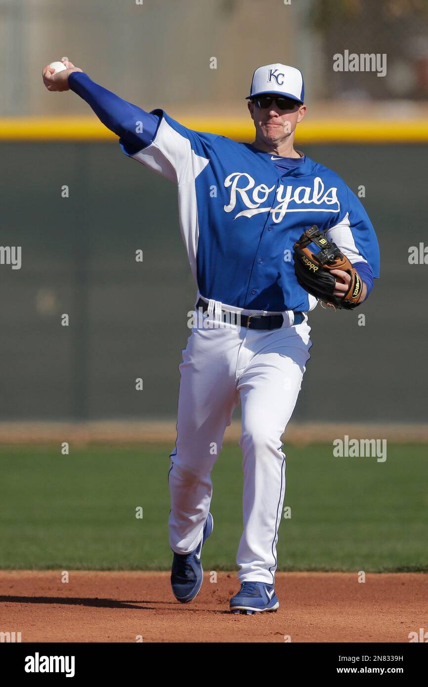 Kansas City Royals' Elliot Johnson throws during a baseball spring ...