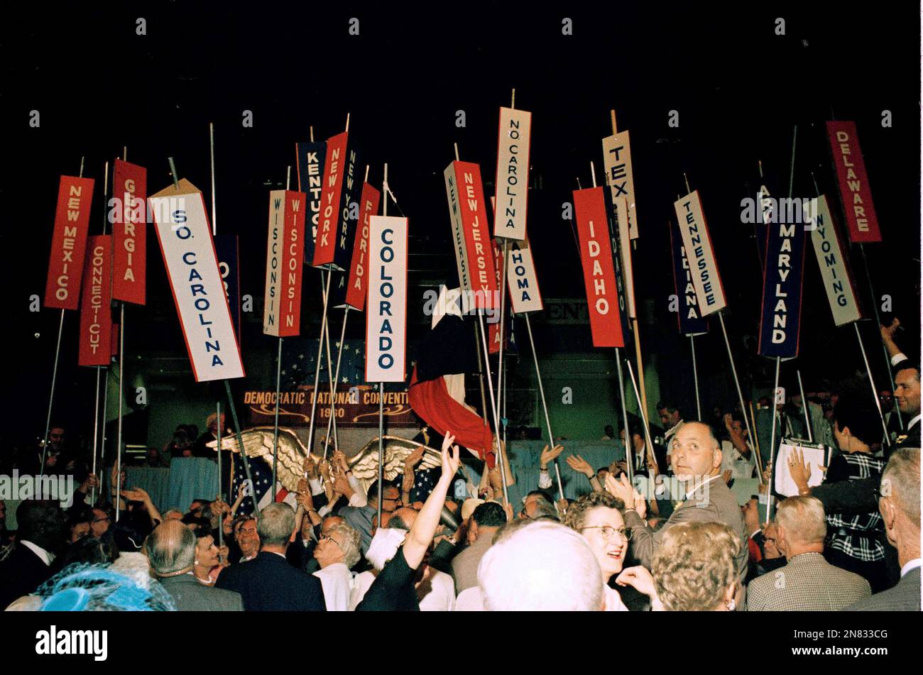 Delegates holding up their states' standards show their support in this ...