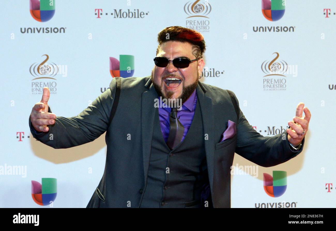 Singer Angel Lopez, of Puerto Rico, poses for photographers on the red ...