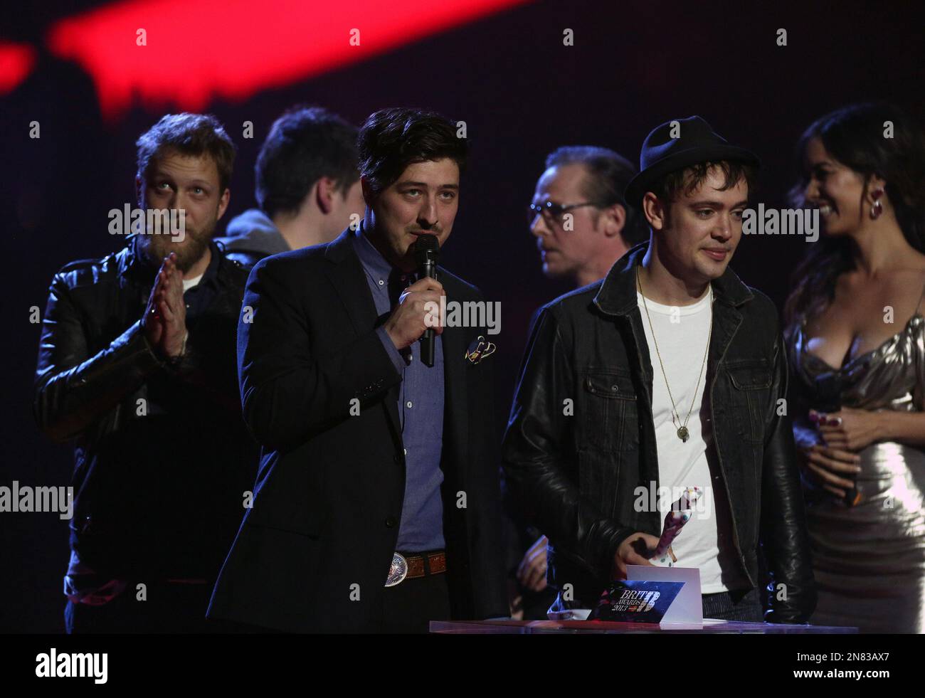 From left, Ted Dwayne, Marcus Mumford, and Ben Lovett of British band ...