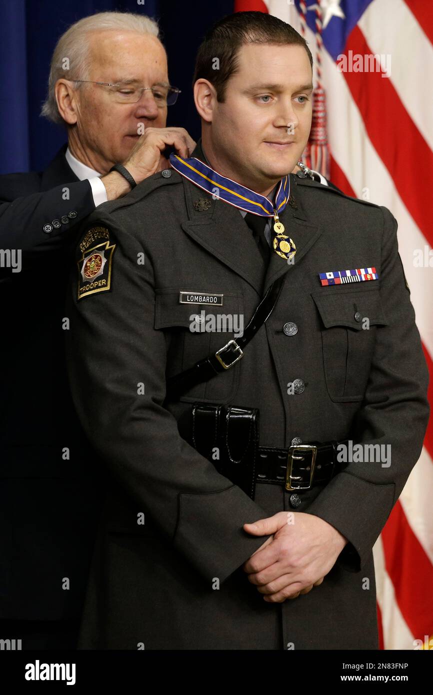 Vice President Joe Biden presents the Medal of Valor to Trooper Robert ...