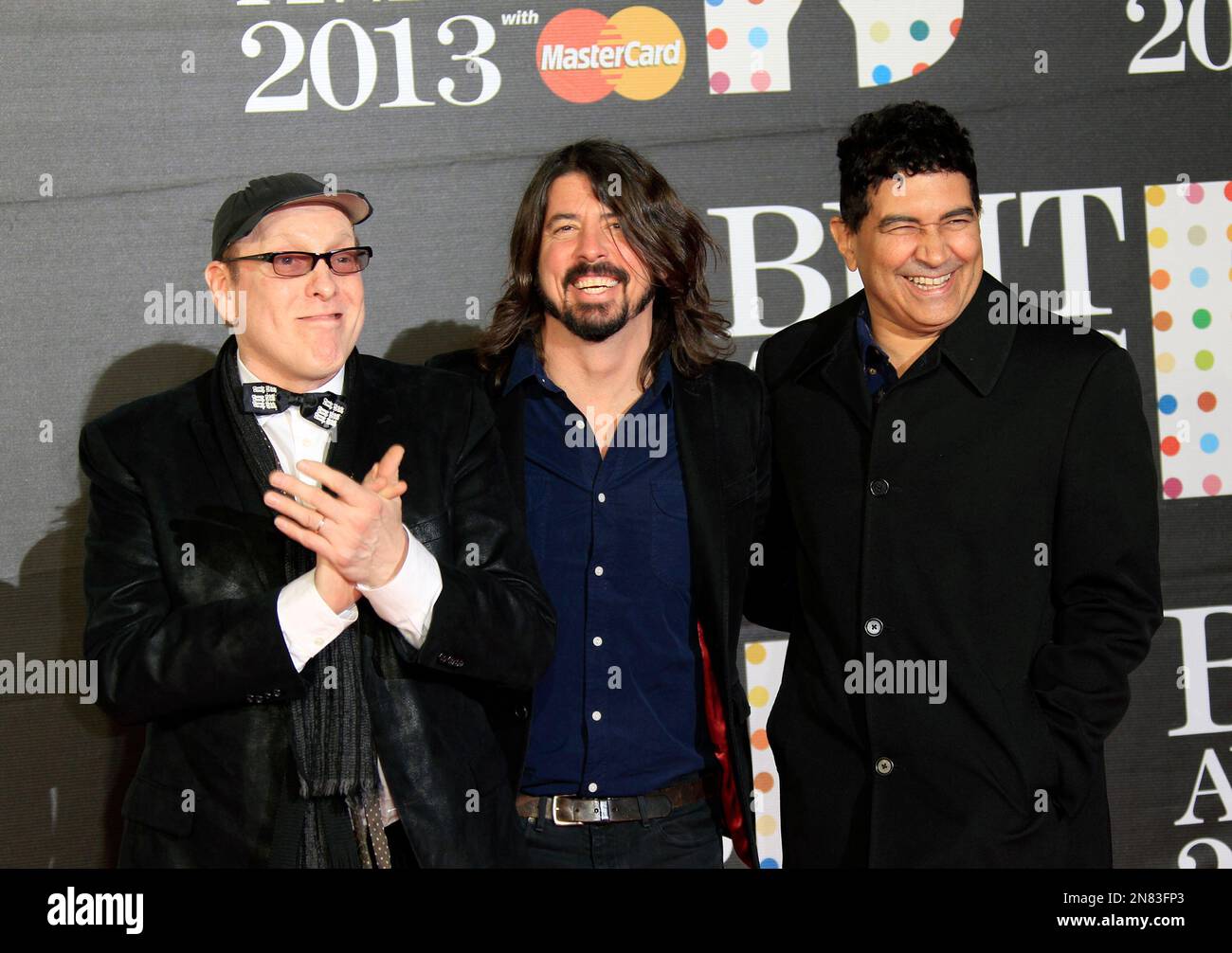 From left, Pat Smear, Dave Grohl and Rick Nielsen seen arriving at the ...