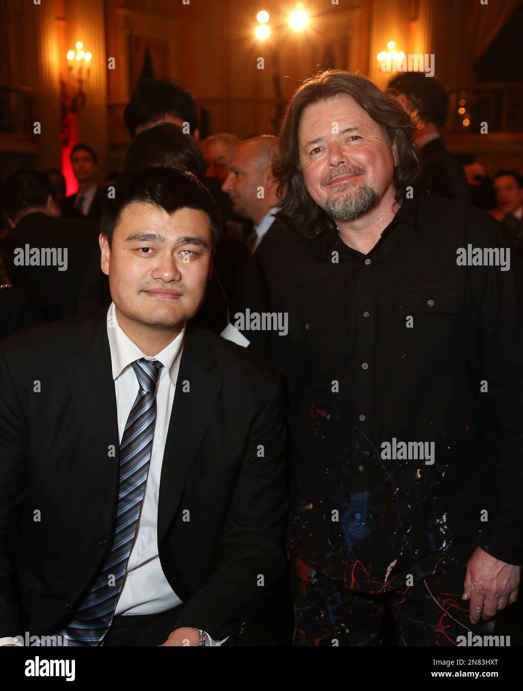 From left, Yao Ming, honored as "Visionary of the Year" and artist ...