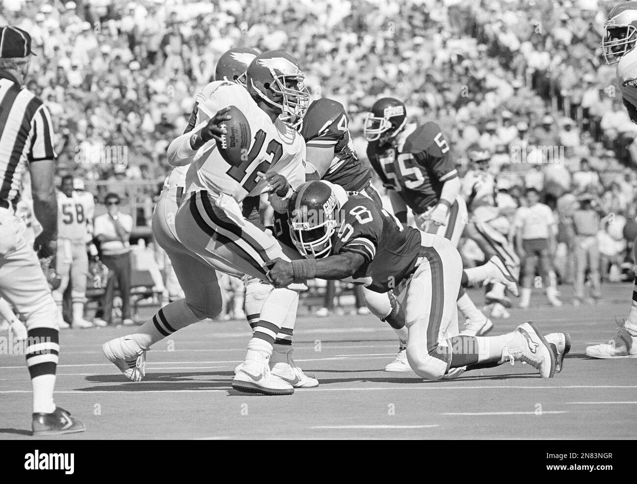 Philadelphia Eagles quarterback Randall Cunningham is sacked by New ...