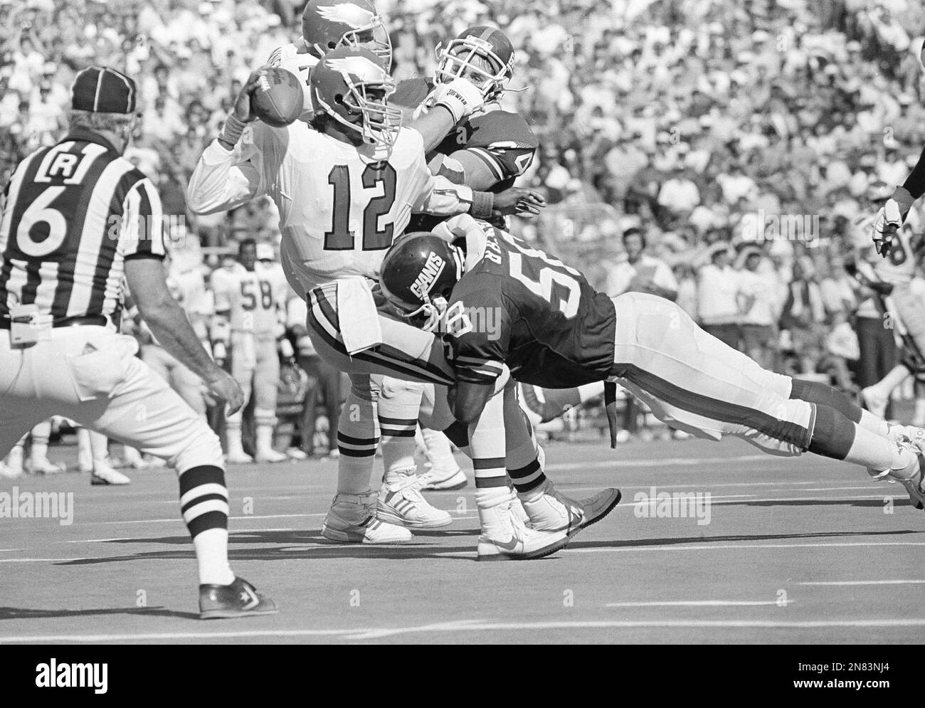 Philadelphia Eagles quarterback Randall Cunningham is sacked by New ...