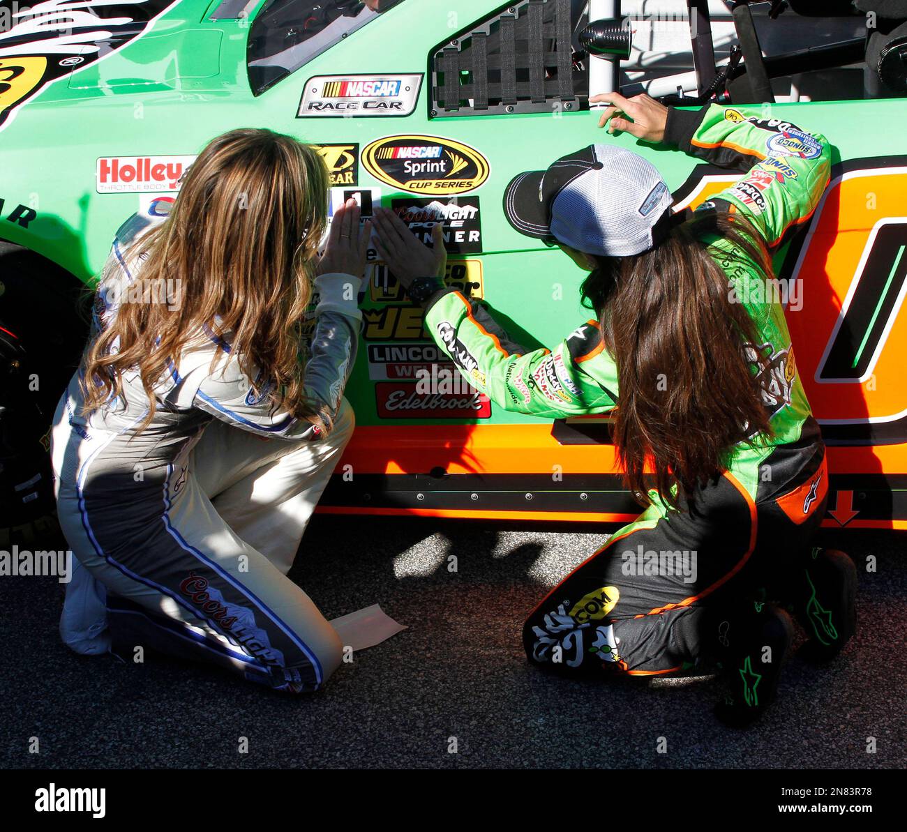 Sprint Cup Series driver Danika Patrick, right and Miss Coors Light put ...