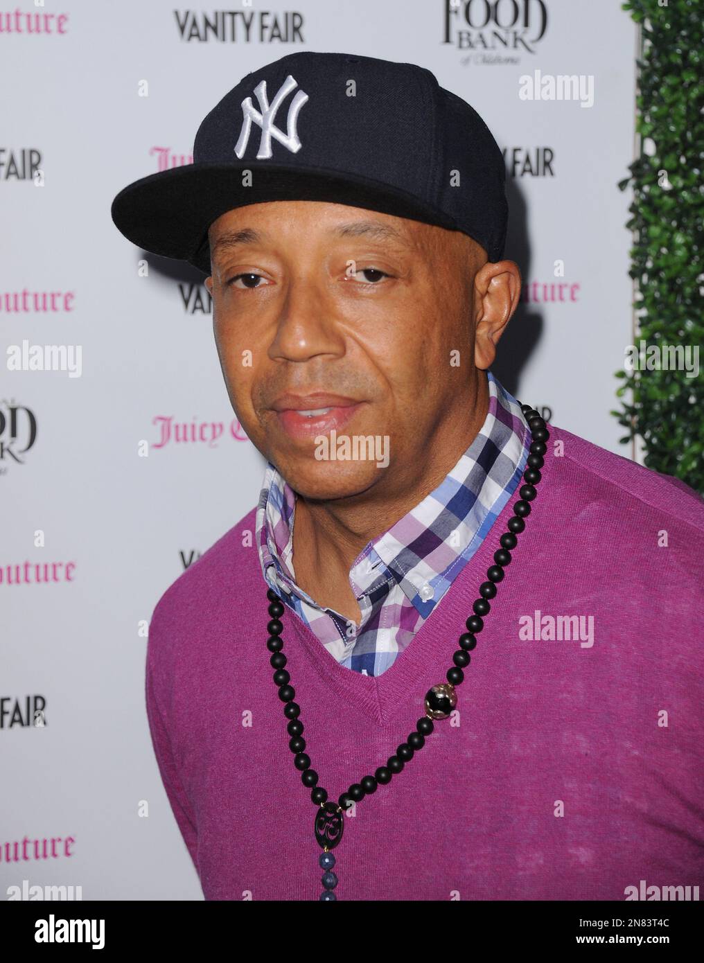 Russell Simmons arrives at the Vanity Fair and Juicy Couture ...