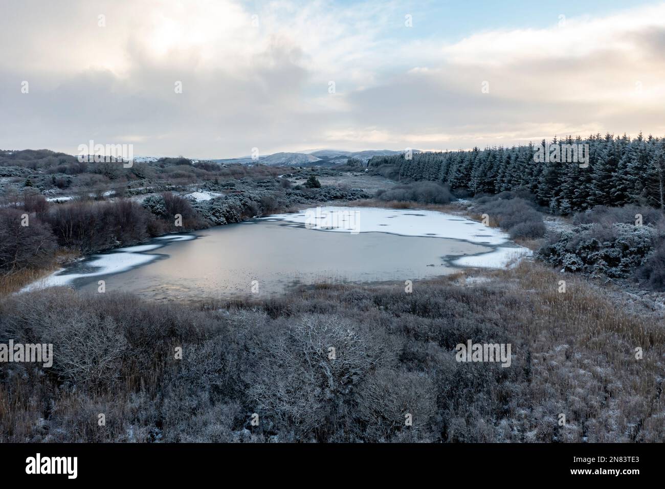 Aerial of lake in a peatbog in winter, Portnoo - County Donegal ...