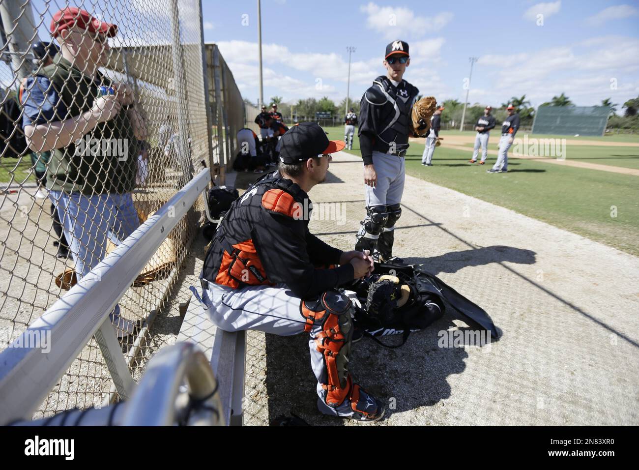 Miami Marlins catchers Jeff Mathis, left, and Rob Brantly suit up as ...