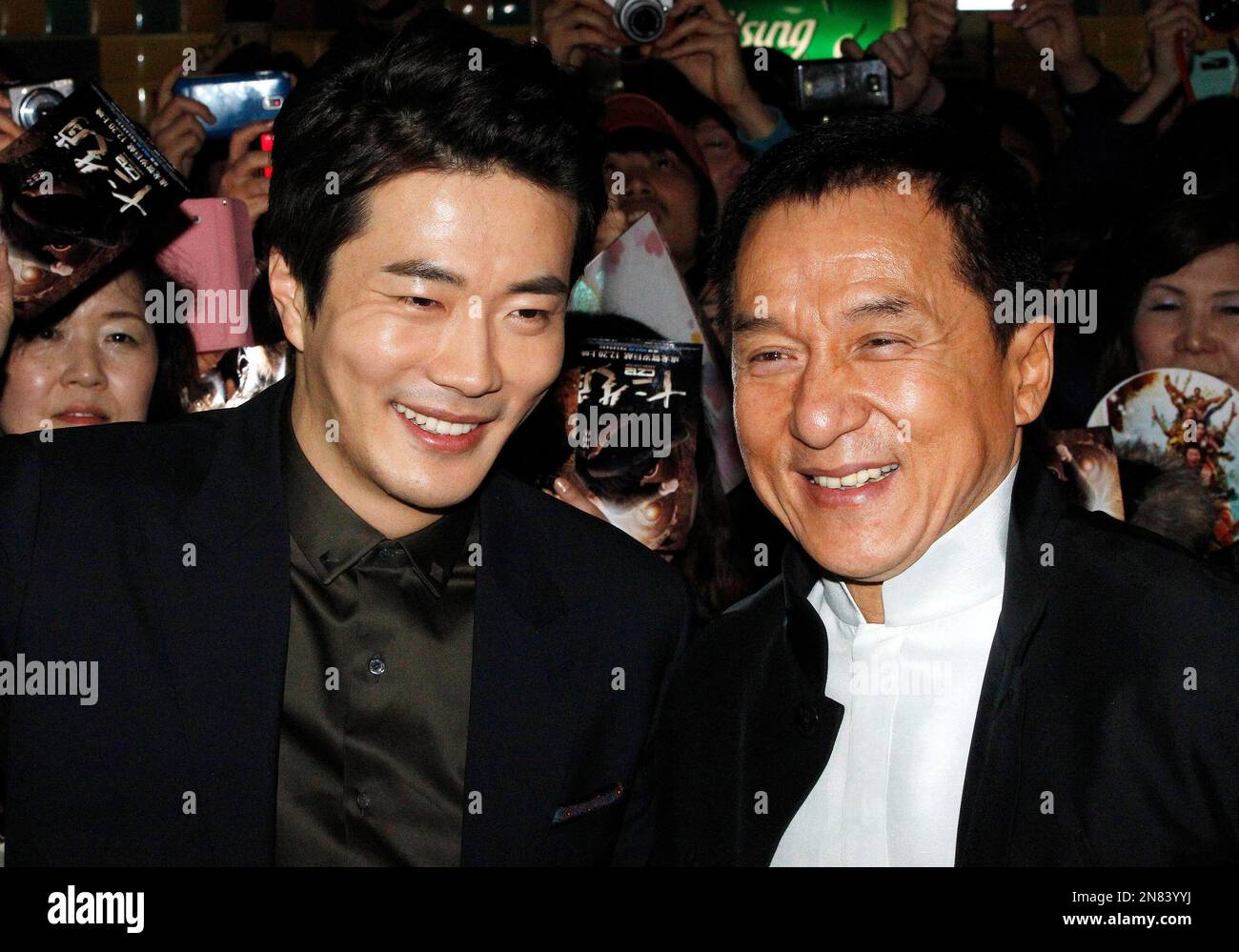 Hong Kong actor and director Jackie Chan, right, and South Korean actor ...