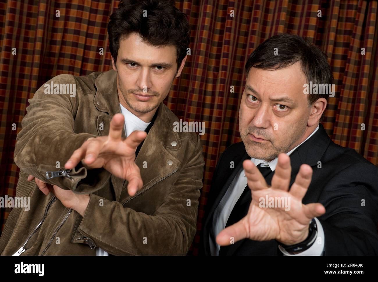 Actor James Franco, left, and director Sam Raimi pose for portraits at ...