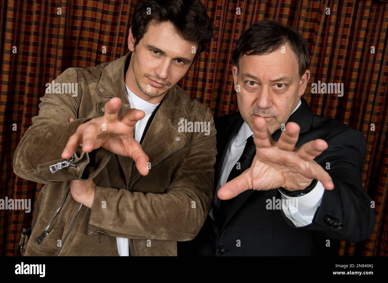 Actor James Franco, left, and director Sam Raimi pose for portraits at ...