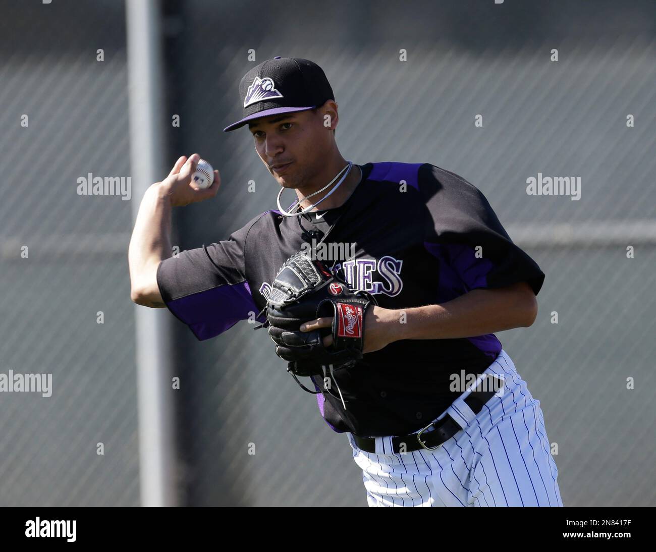 Colorado Rockies' Joe Gardner throws during a spring training baseball ...