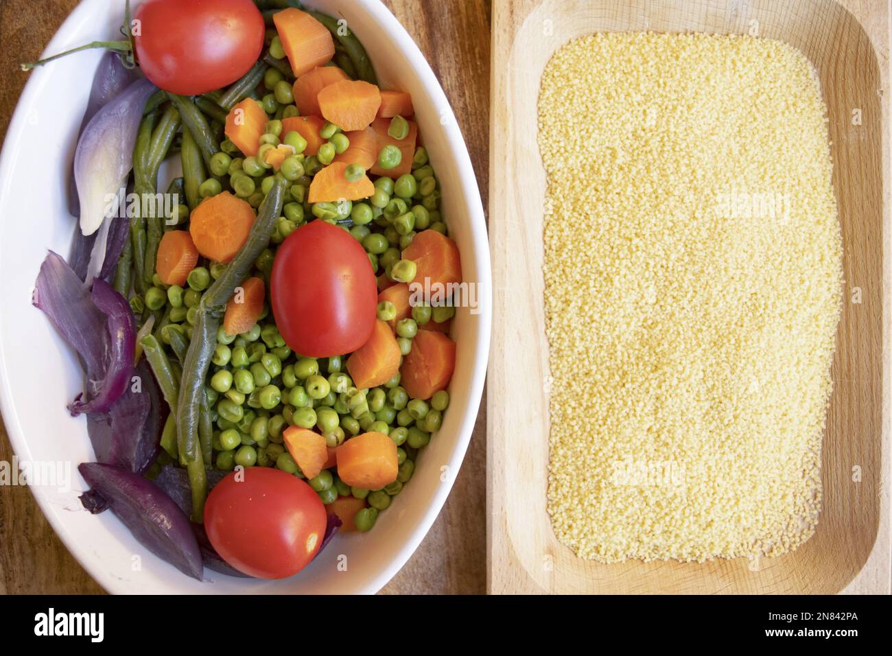 traditional vegetarian couscous with steamed mixed vegetables and herbs ...