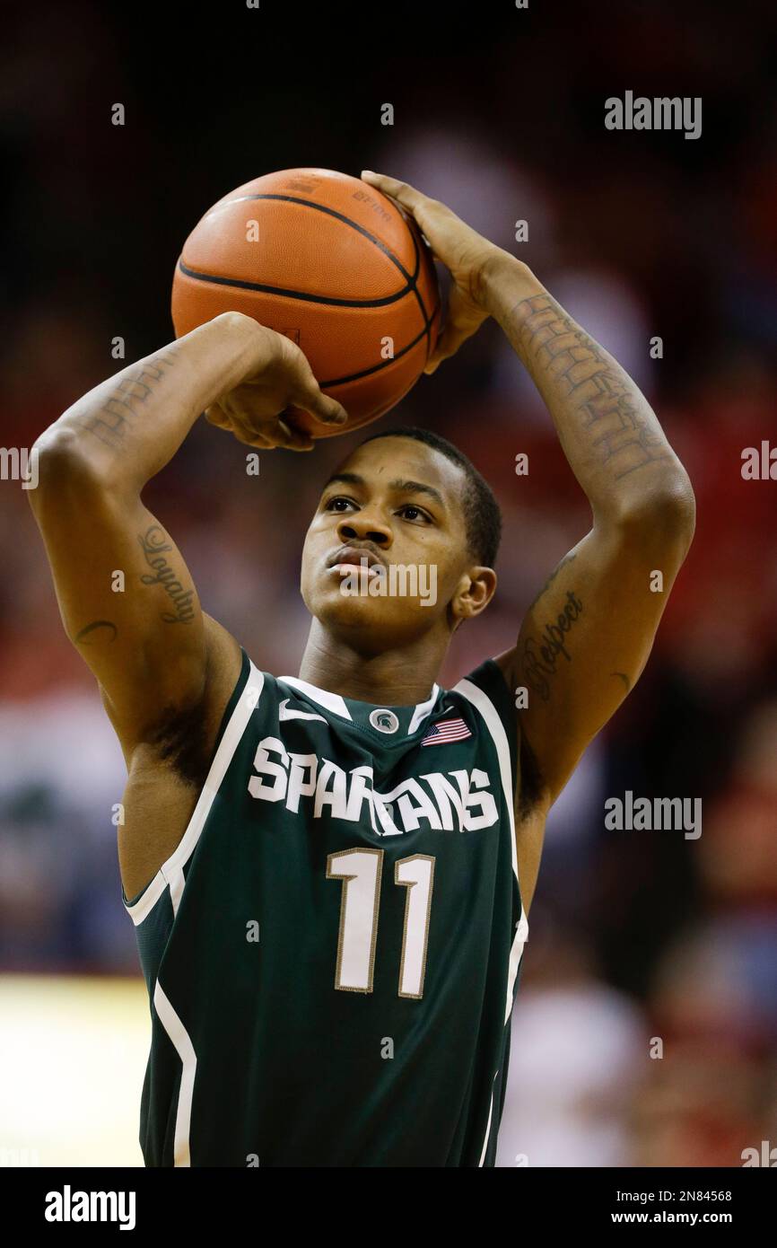 Michigan State's Keith Appling shoots from the free-throw line against ...