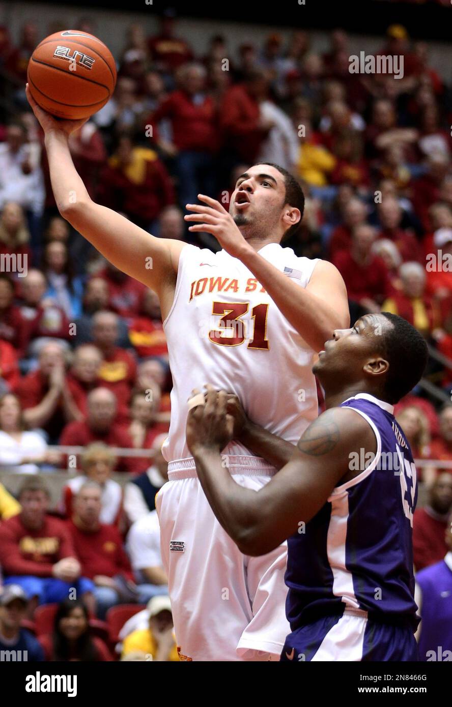 Iowa State forward Georges Niang (31) puts up a shot over TCU forward ...