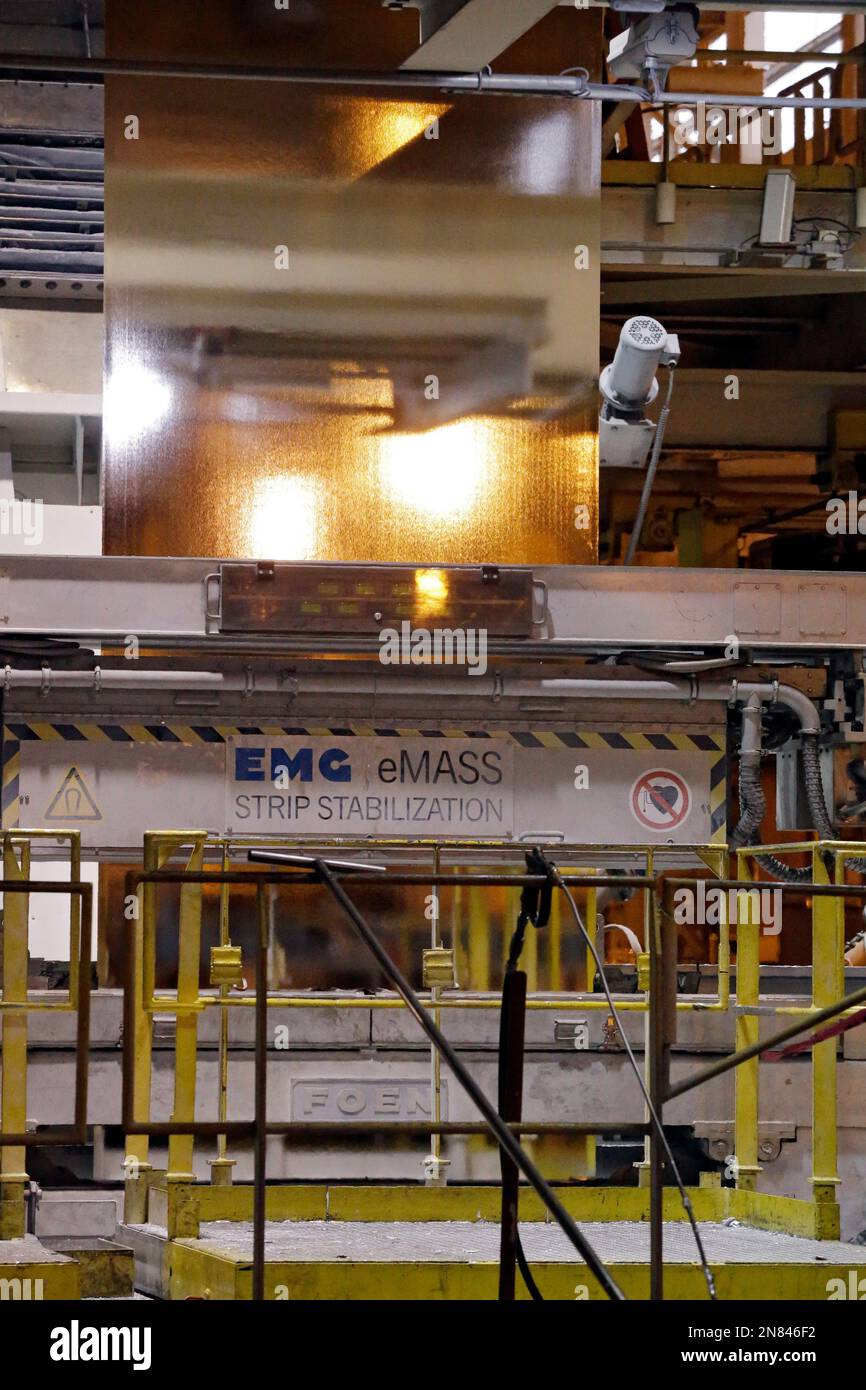 Galvanized steel runs through a strip stabilizer at ArcelorMittal Steel ...