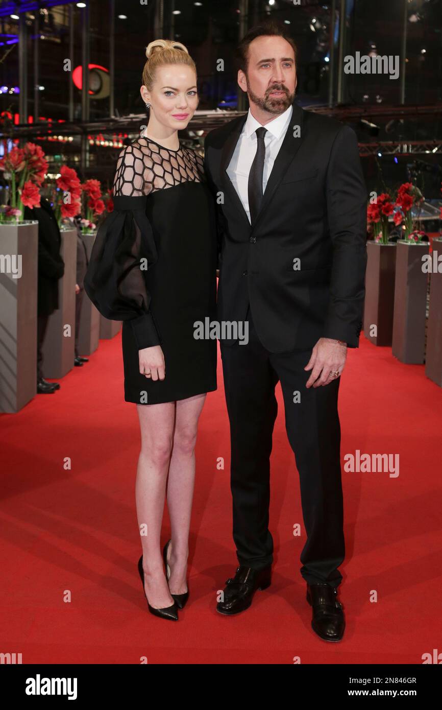 Actors Emma Stone, left, and Nicholas Cage arrive for the screening of ...