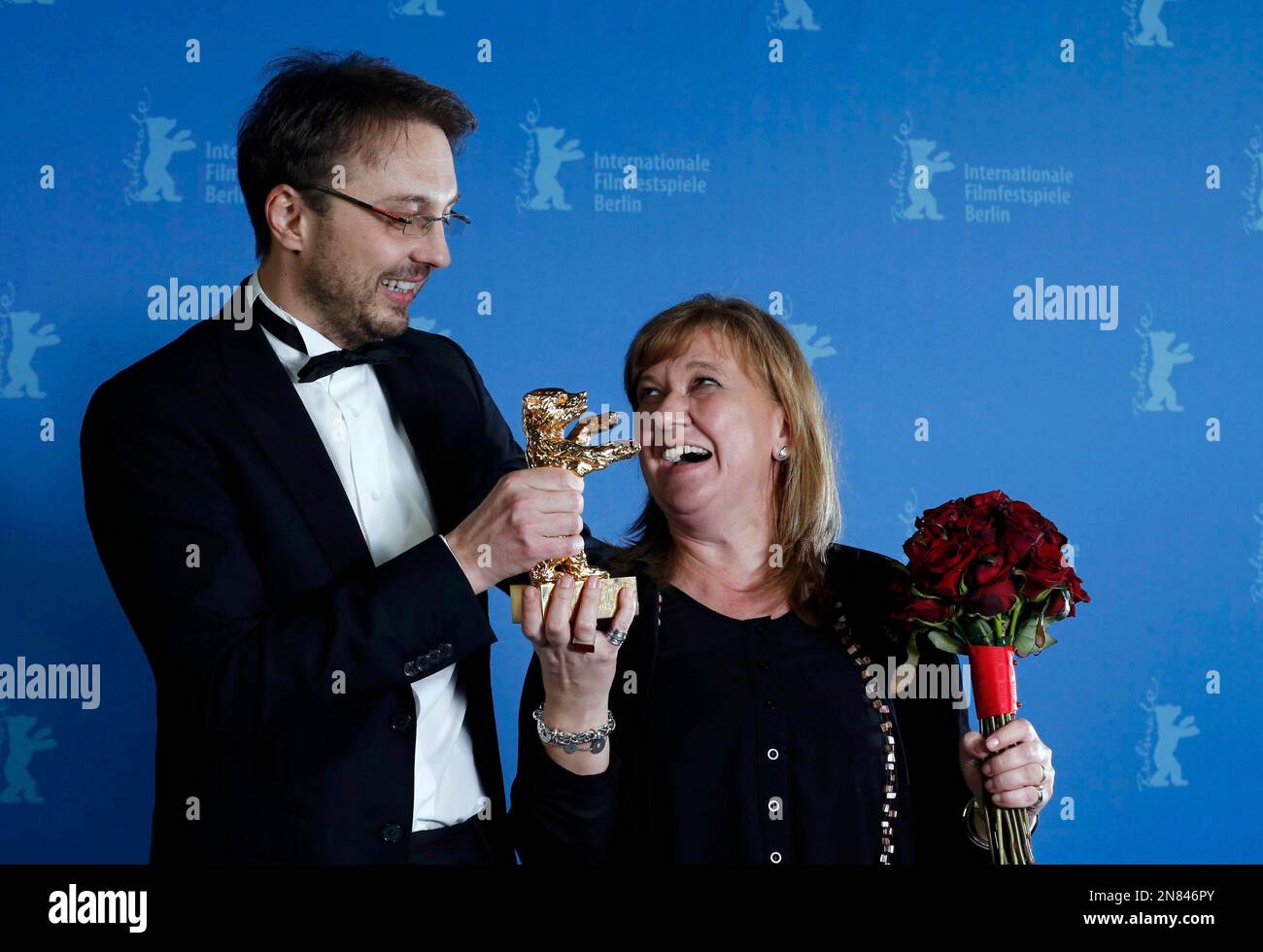 Director Calin Peter Netzer and producer Ada Solomon pose backstage ...