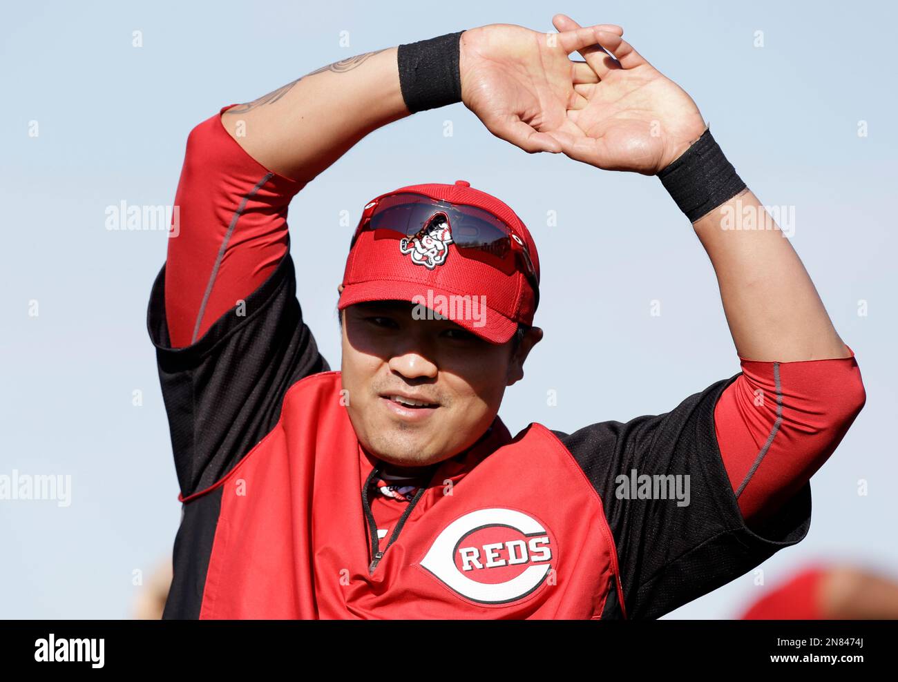 Cincinnati Reds outfielder Shin-Soo Choo, of South Korea, stretches ...