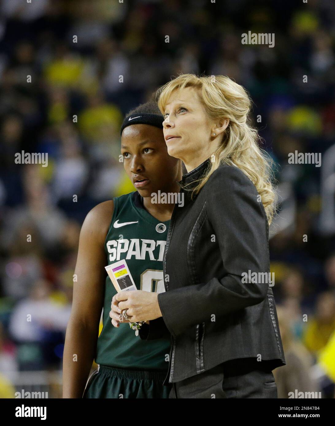 Michigan State guard Kiana Johnson (0) talks with head coach Suzy ...