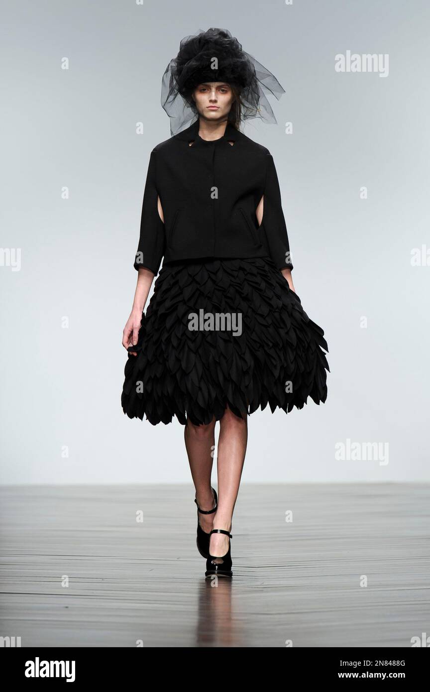 A model wears a design from the John Rocha collection during London ...
