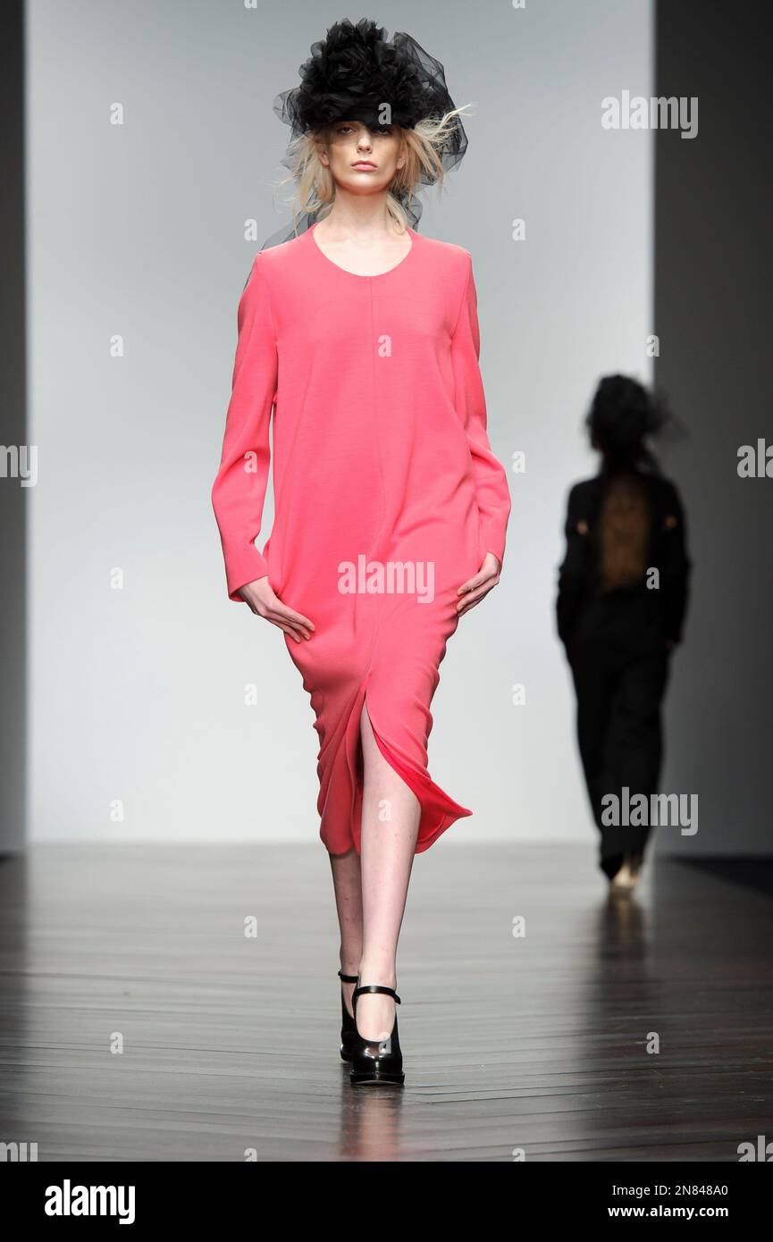 Models wear a design from the John Rocha collection during London ...