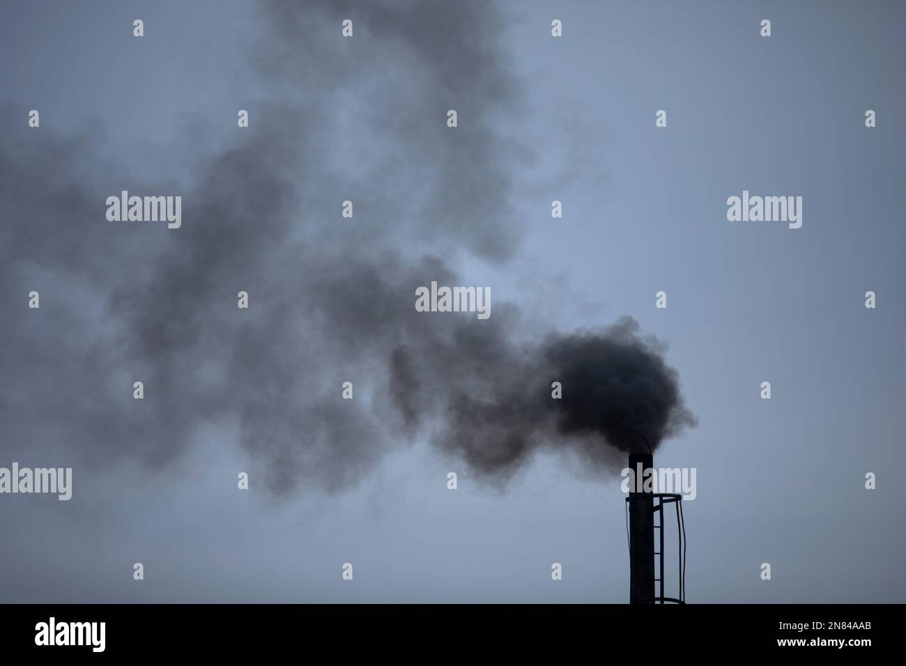 Smoke from a chimney that is harmful and very toxic to humans Stock ...
