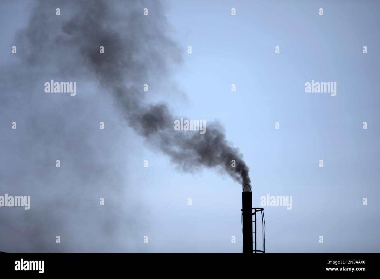 Smoke from a chimney that is harmful and very toxic to humans Stock ...