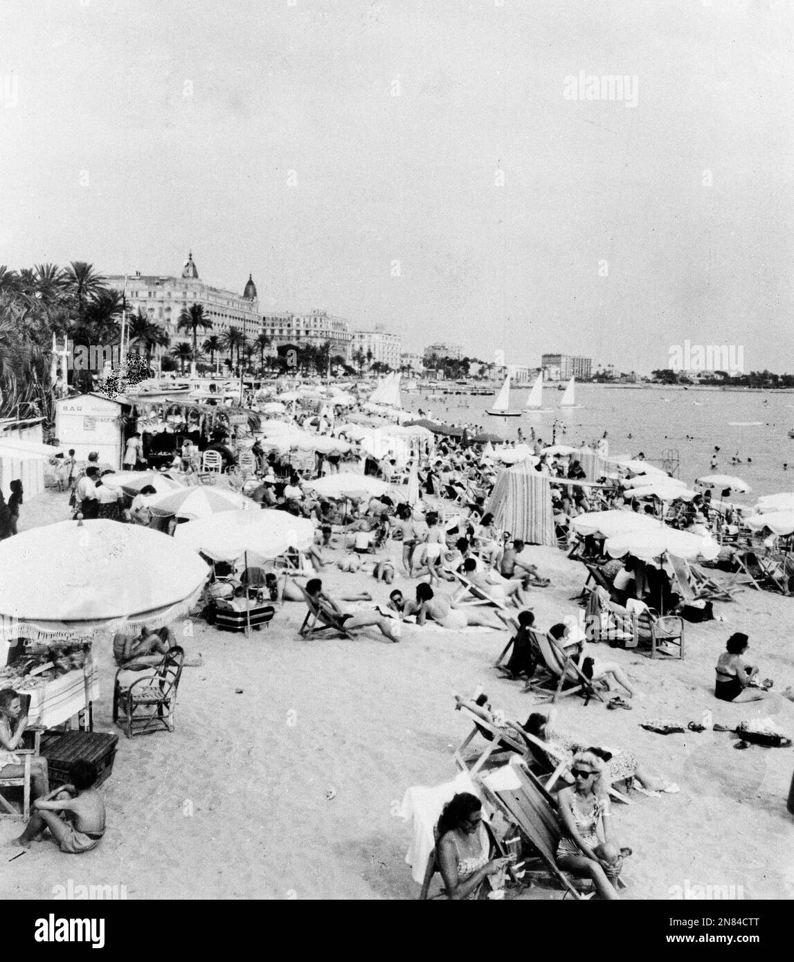 People enjoy their day at a beach in Cannes, France, 1955. (AP Photo ...