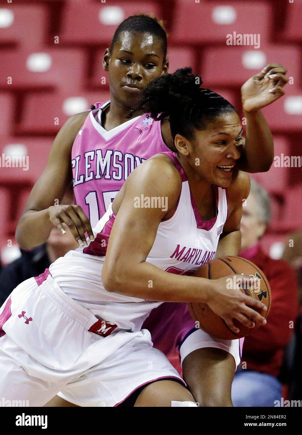 Maryland forward Alyssa Thomas, front, drives against Clemson forward ...