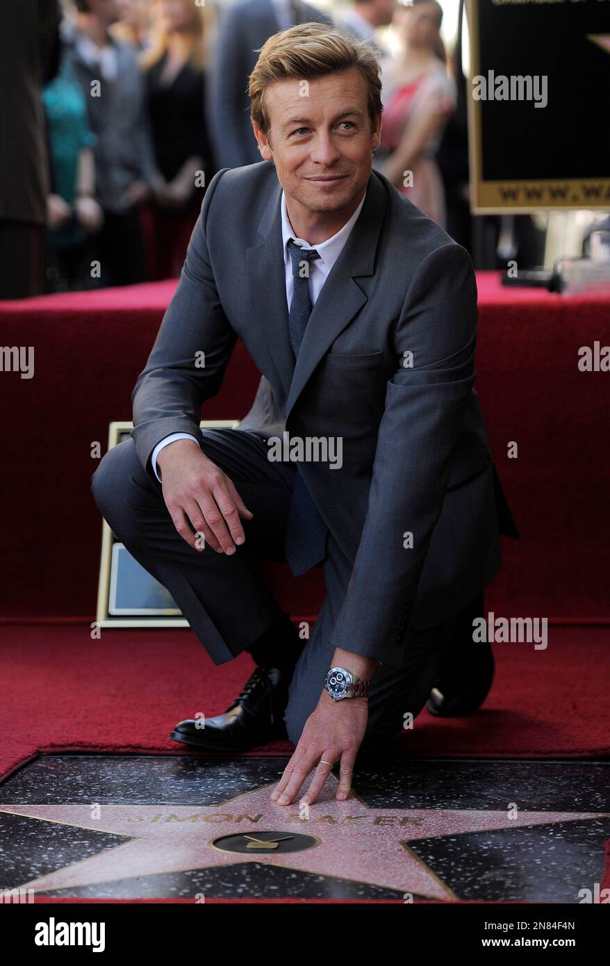 Australian actor Simon Baker poses after receiving a star on the ...