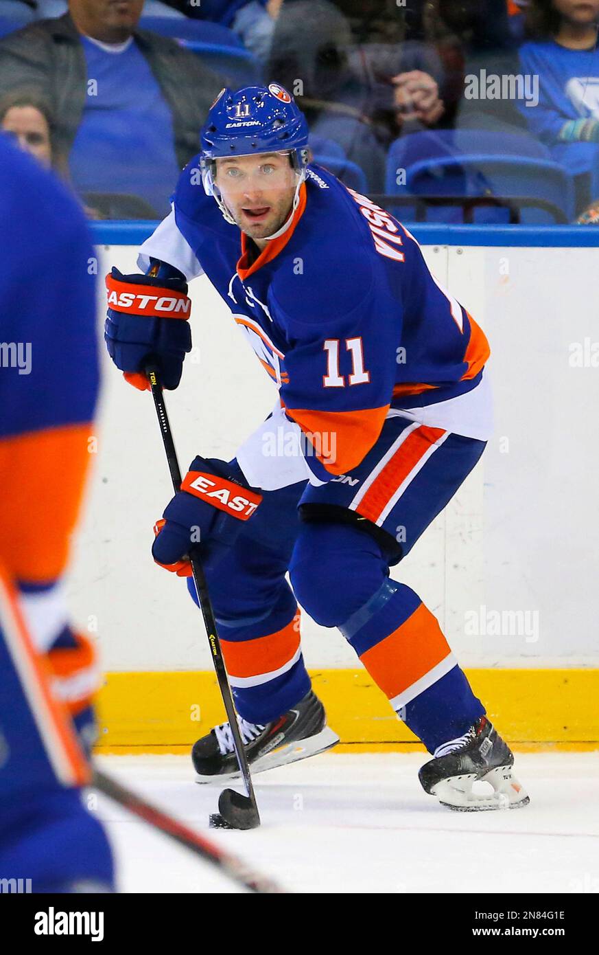 New York Islanders defenseman Lubomir Visnovsky (11) skates up ice ...