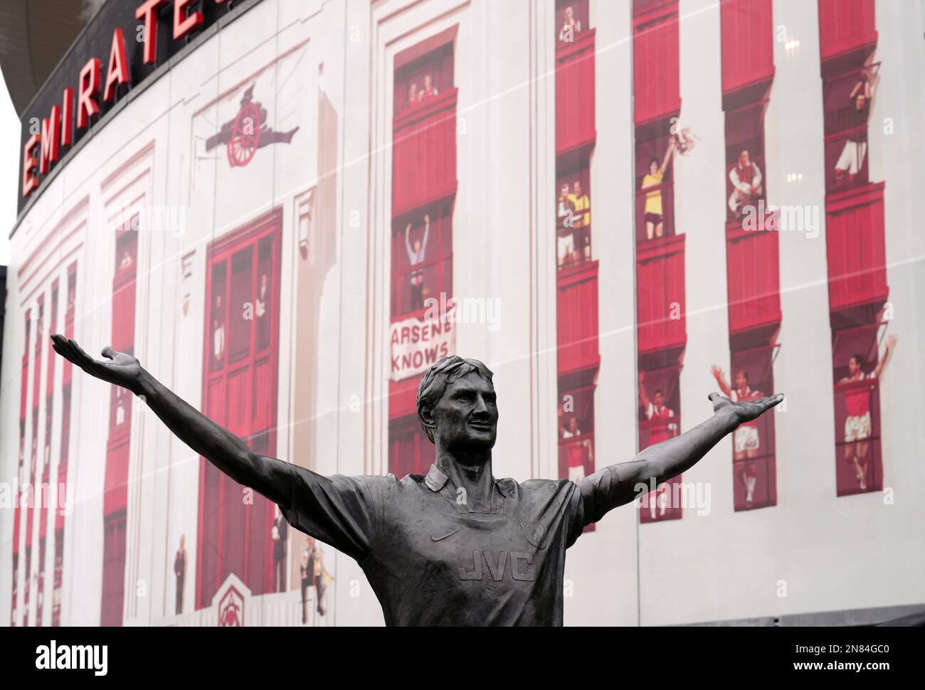 The Tony Adams statue in front of new artwork on the outside of the ...