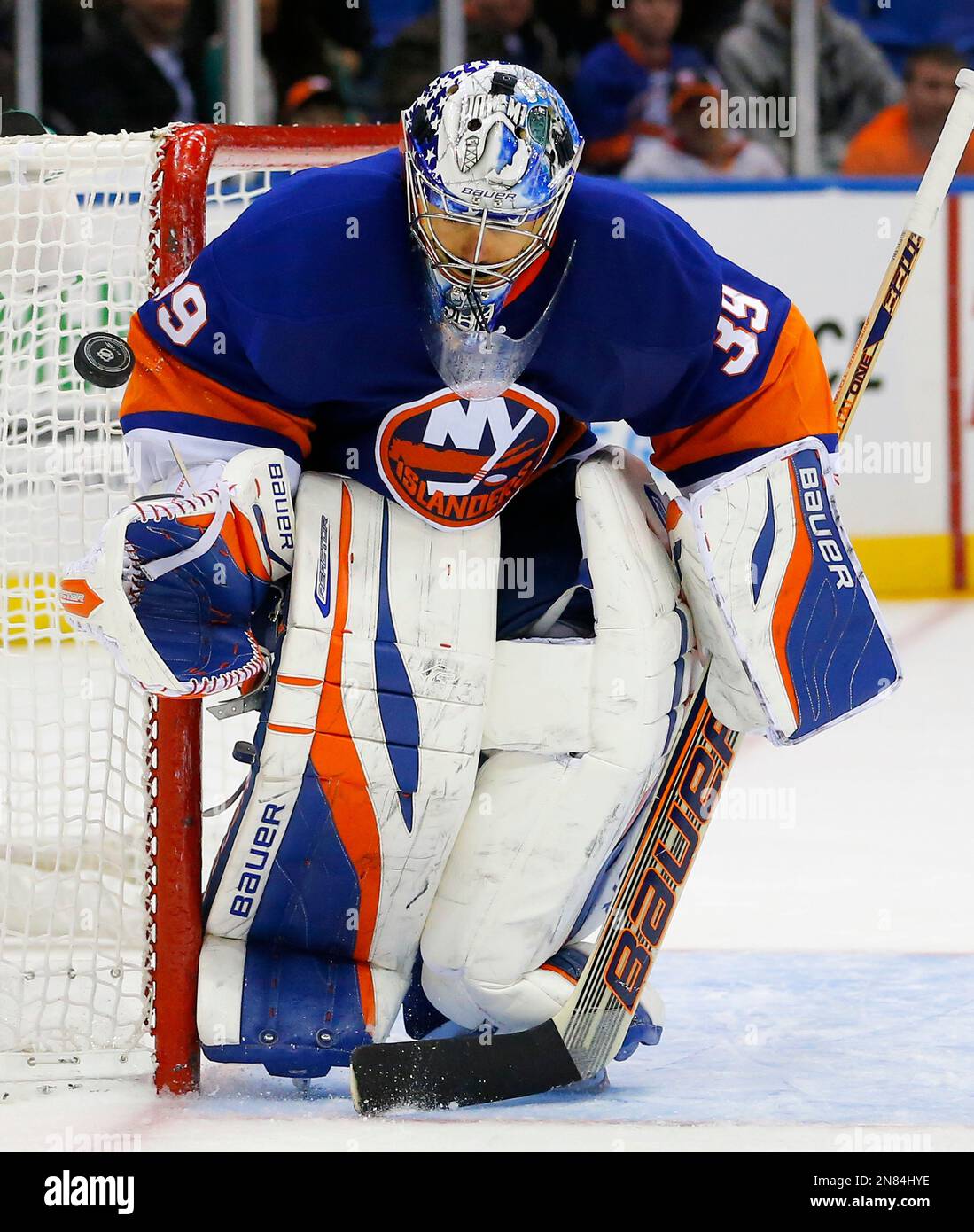 New York Islanders goalie Rick DiPietro (39) makes a save during an NHL ...
