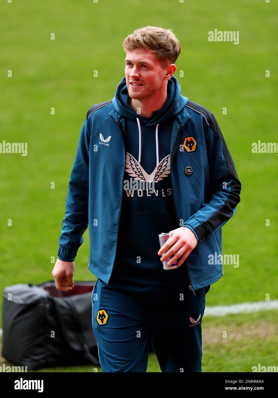 Wolverhampton Wanderers' Nathan Collins inspects the pitch ahead of the ...