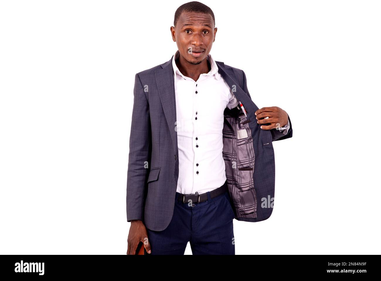 Man taking off jacket Cut Out Stock Images & Pictures - Alamy