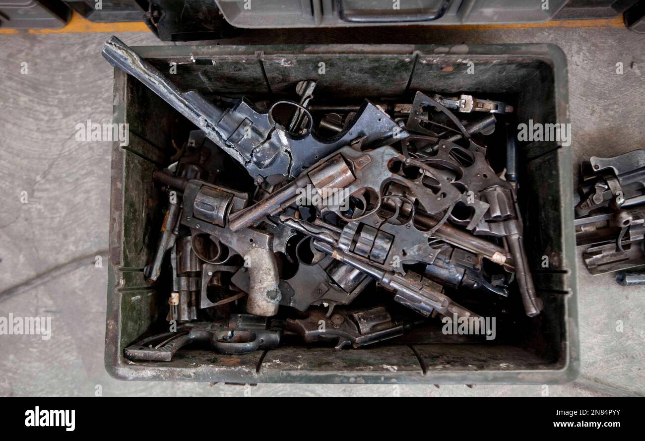 Weapons fill a bin in the studio of Mexican artist Pedro Reyes in ...