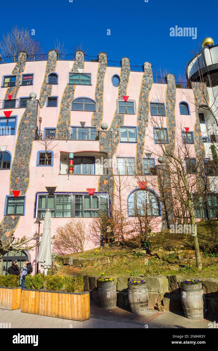 Wooden barrels in front of the green citadel building in Magdeburg ...