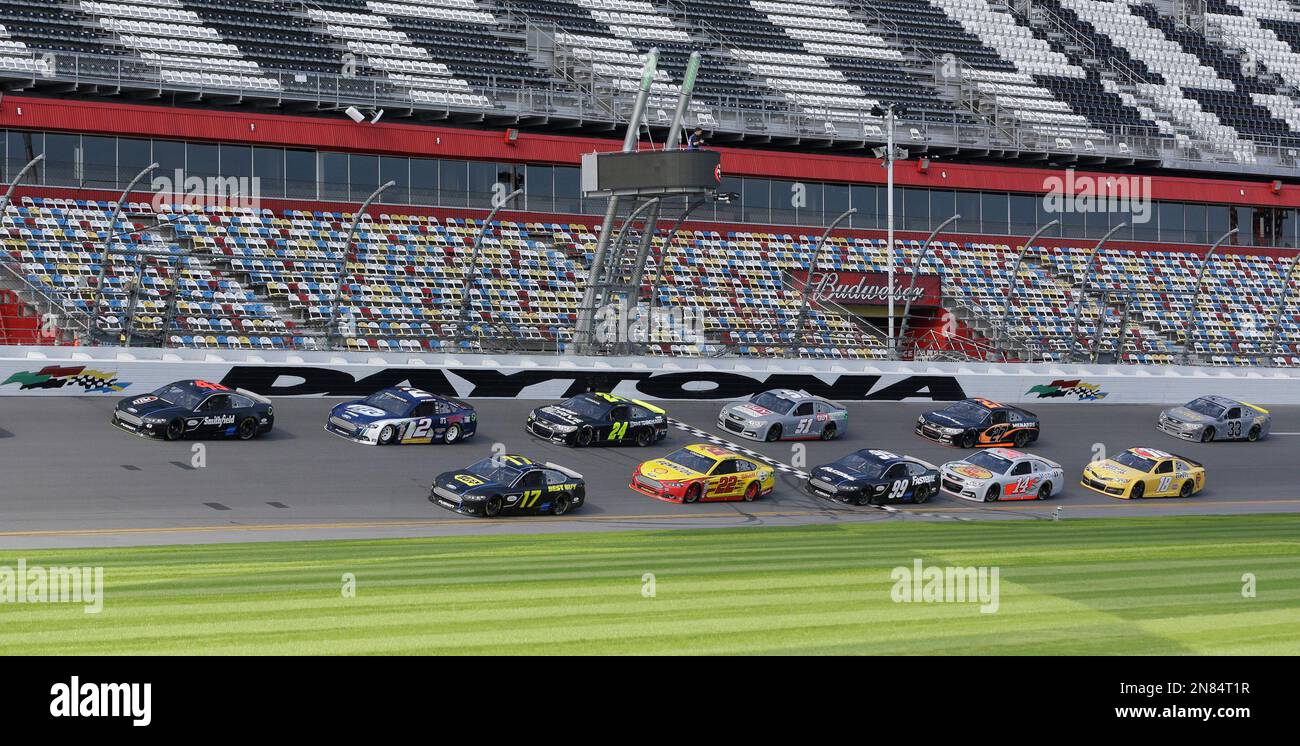 FILE - In this Jan. 11, 2013, file photo, a pack of cars drives past ...