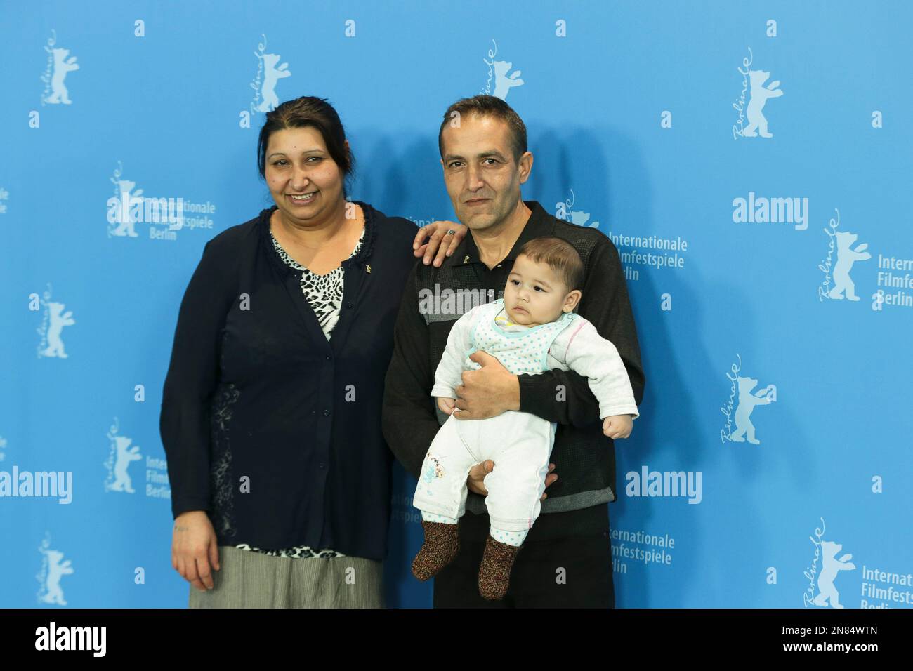 From left, actress Senada Alimanovic and actor Nazif Mujic holding baby ...