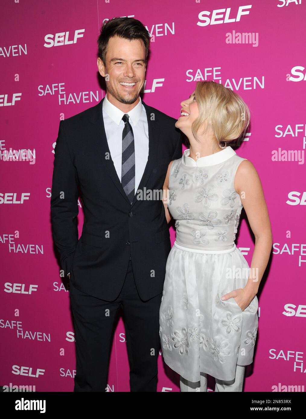 Actors Josh Duhamel and Julianne Hough attend the premiere of "Safe ...