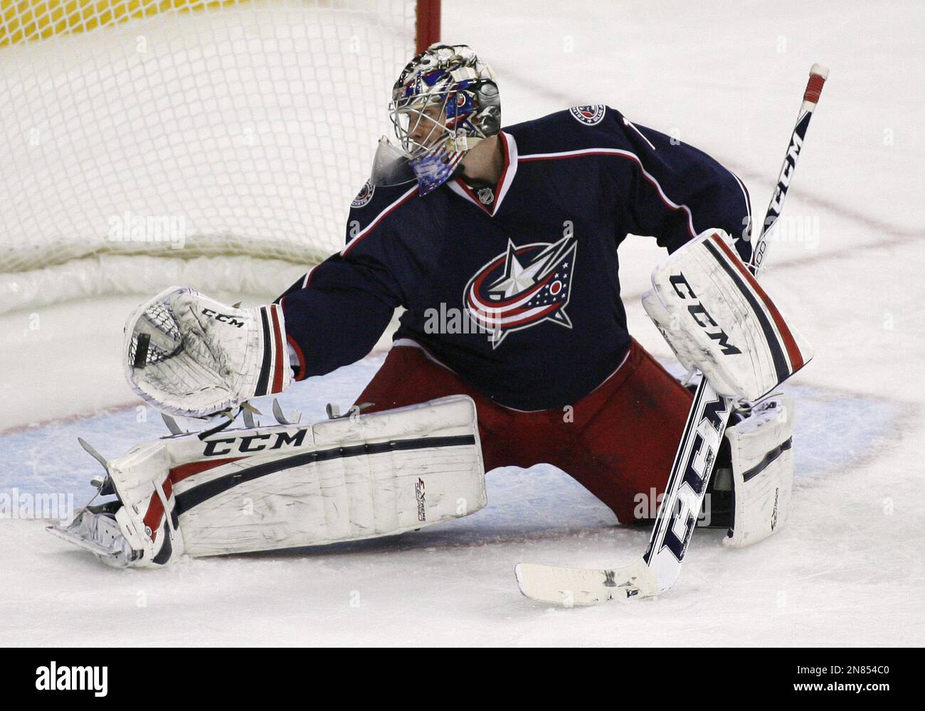 Columbus Blue Jackets goalie Steve Mason (1) gloves a shot by the San ...