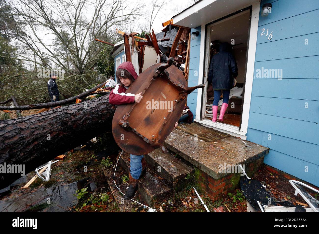 Brenda Fortson of Meridian, mother of Jessie Fortson, carries out a ...
