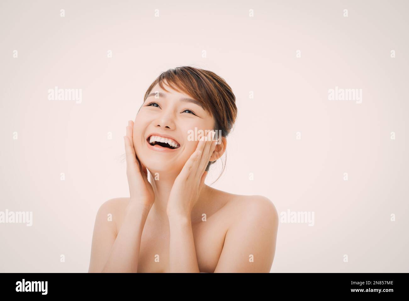 Portrait of Beautiful Skin care woman enjoy and happy, touching her ...