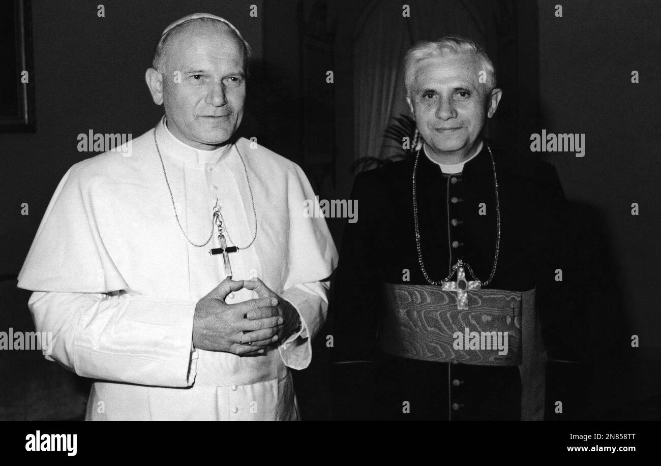 FILE - In this 1979 file photo, Pope John Paul II, left, poses with ...